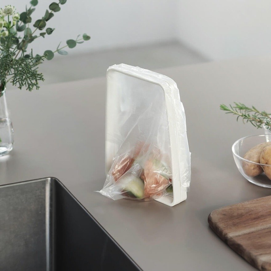 A Handy Kitchen Doodad for Repurposing Produce Bags to Collect Trash ...