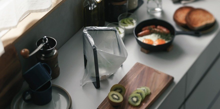 A Handy Kitchen Doodad for Repurposing Produce Bags to Collect Trash ...