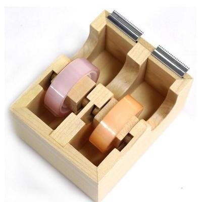 Three Different Design Approaches to Dual-Roll Tape Dispensers - Core77