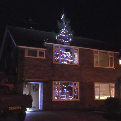 How Colin Furze Fit a Three-Story Christmas Tree Inside a Two-Story ...