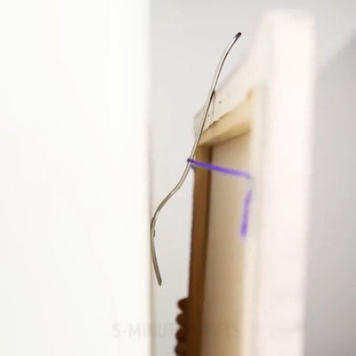 An Easy Way to Hang Pictures: Use a Fork - Core77